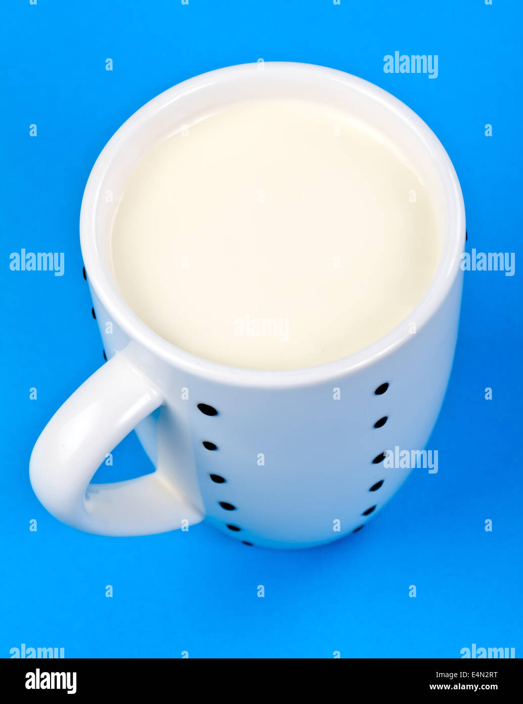 cupful of milk Stock Photo - Alamy