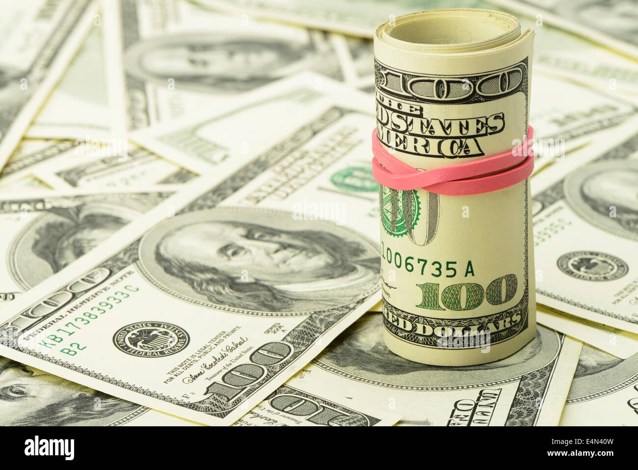 Rolls of dollars Stock Photo - Alamy