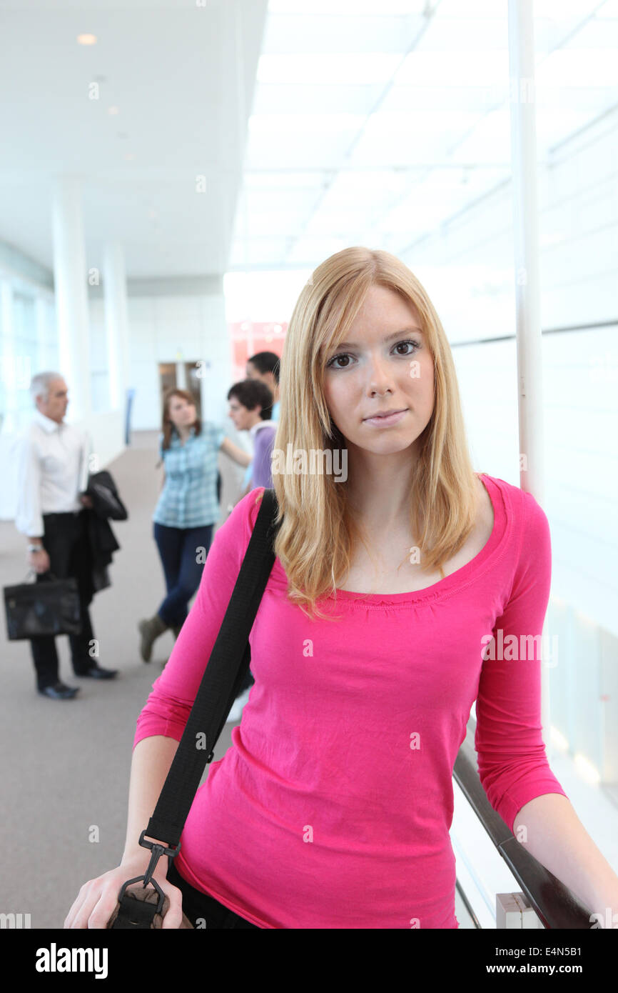 Teen getting out of class Stock Photo - Alamy