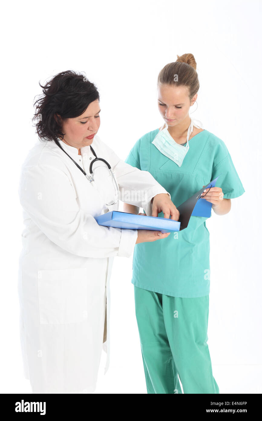 Doctor and nurse in discussion Stock Photo - Alamy