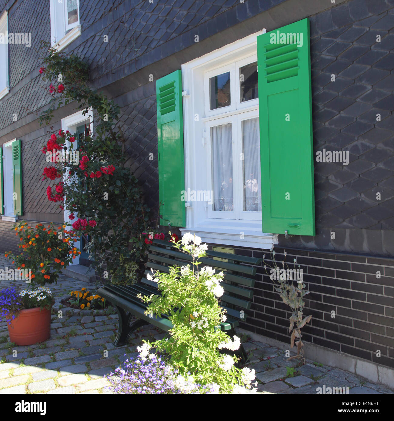 Bench in front of house hi-res stock photography and images - Alamy