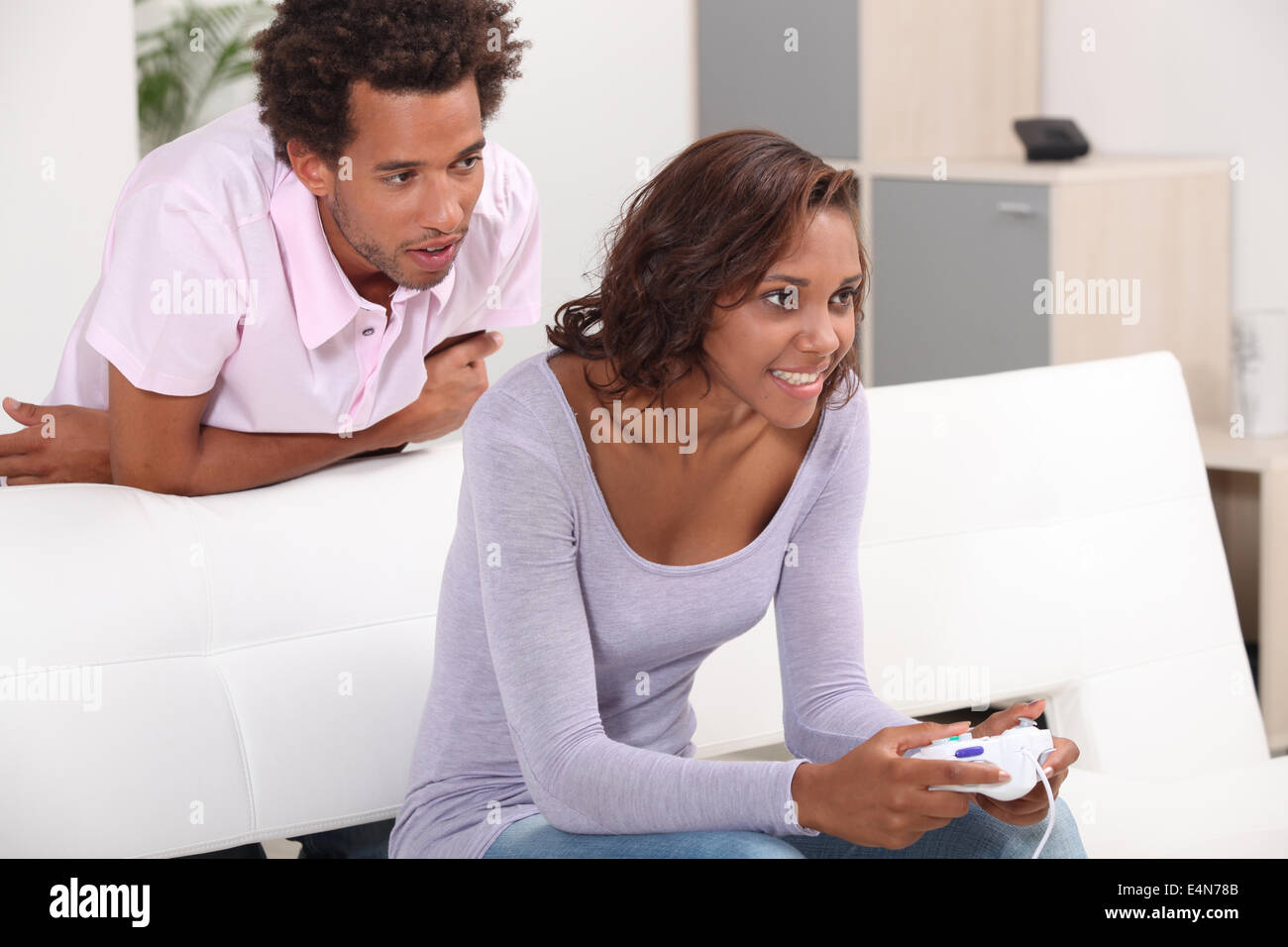 Woman playing computer games Stock Photo - Alamy