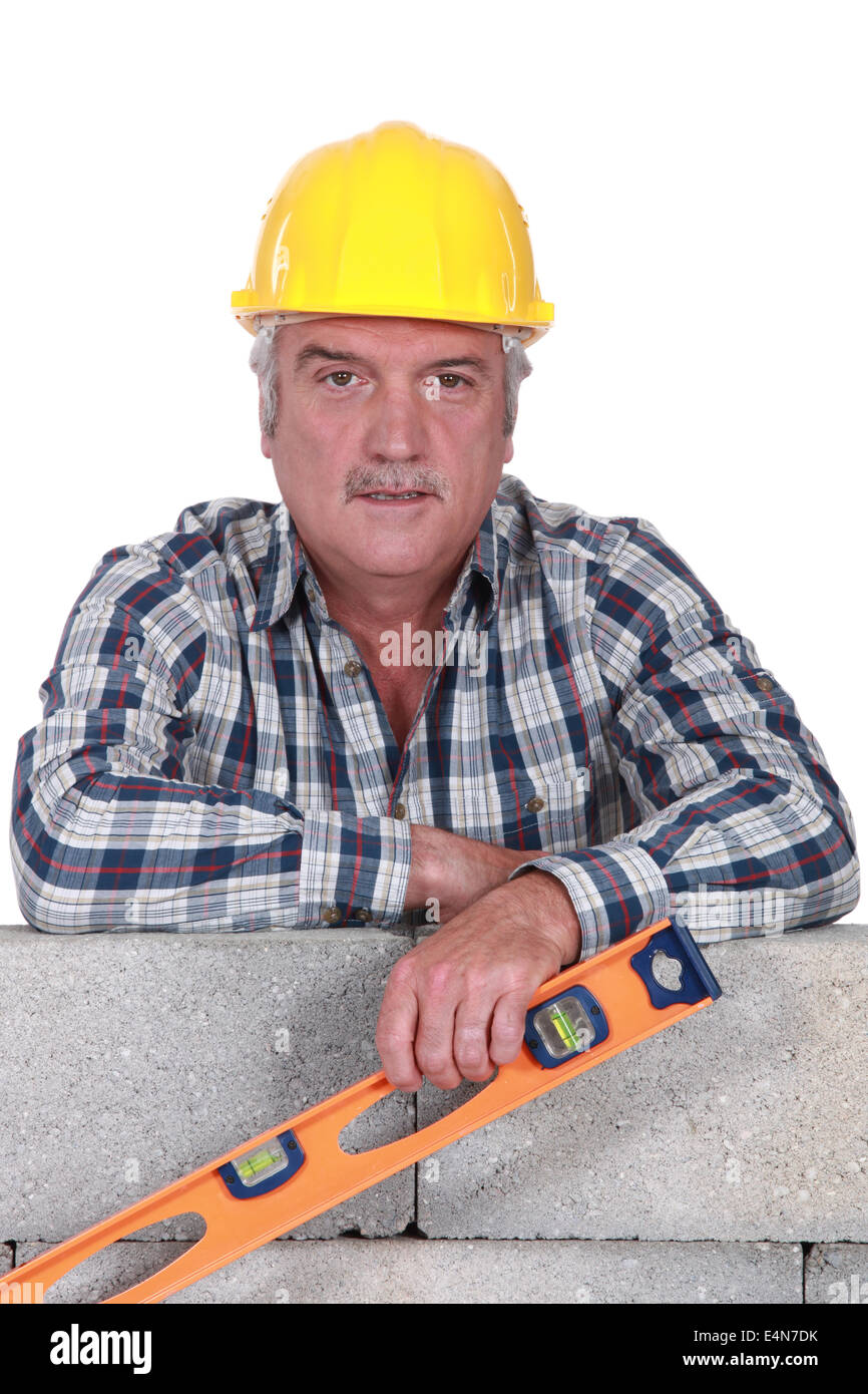 craftsman holding a level Stock Photo - Alamy