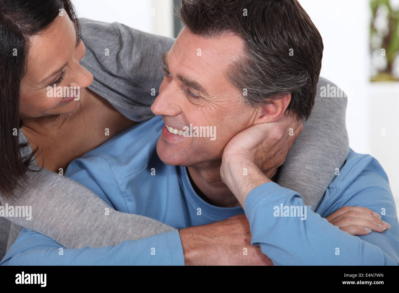 Couple in a loving embrace Stock Photo - Alamy