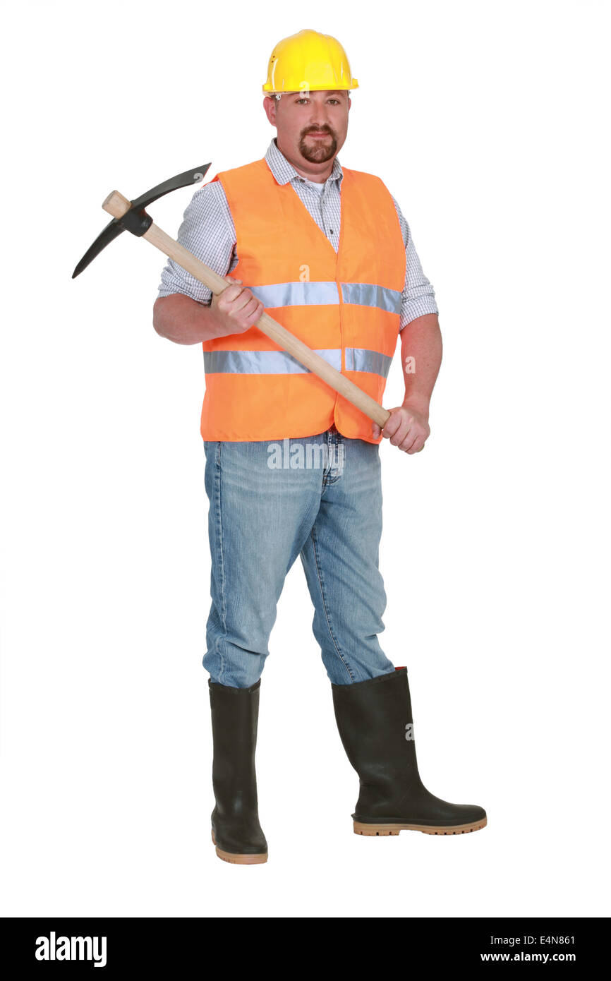 Man holding pick-Axe Stock Photo - Alamy