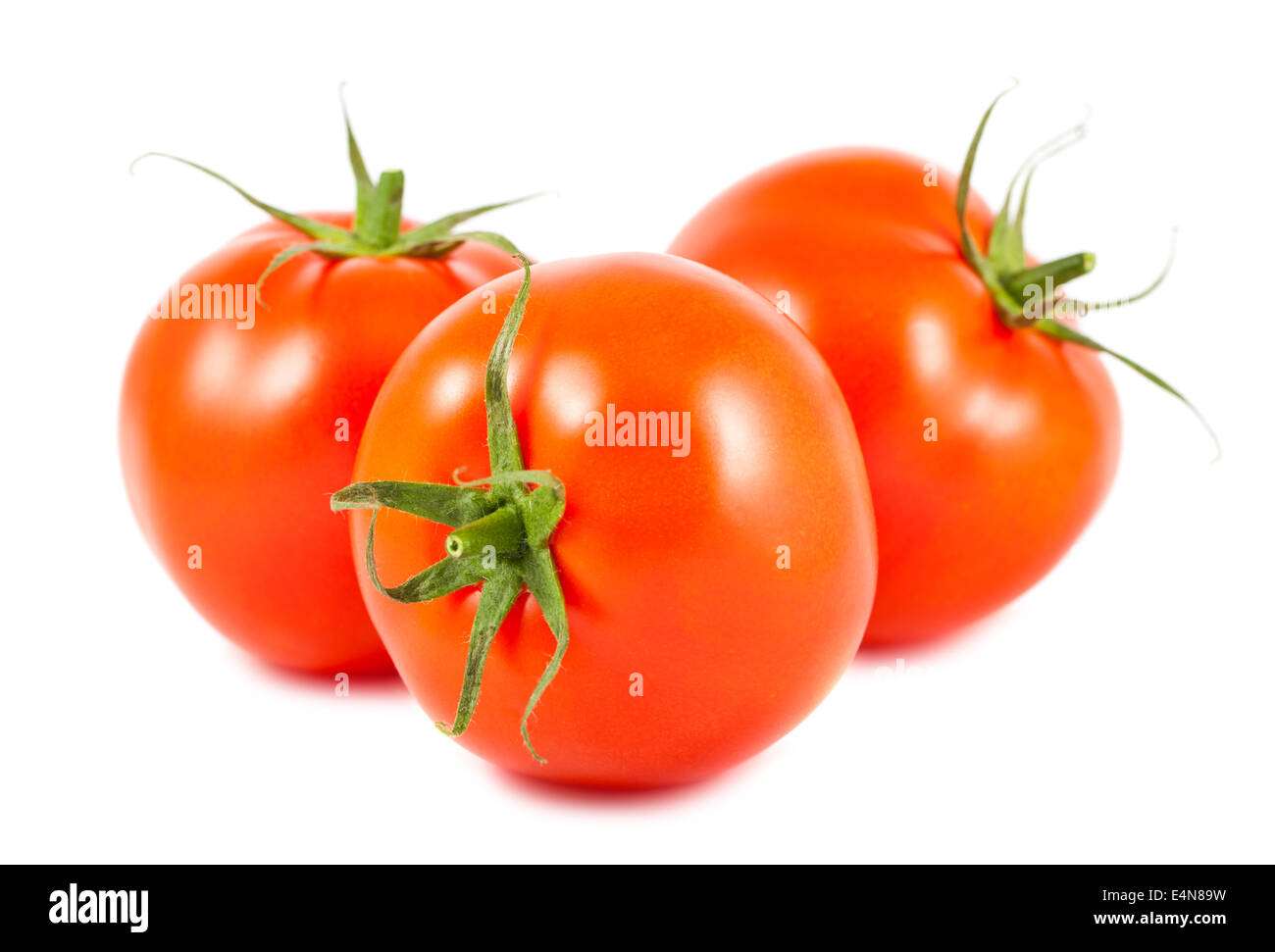 Three red tomato Stock Photo - Alamy