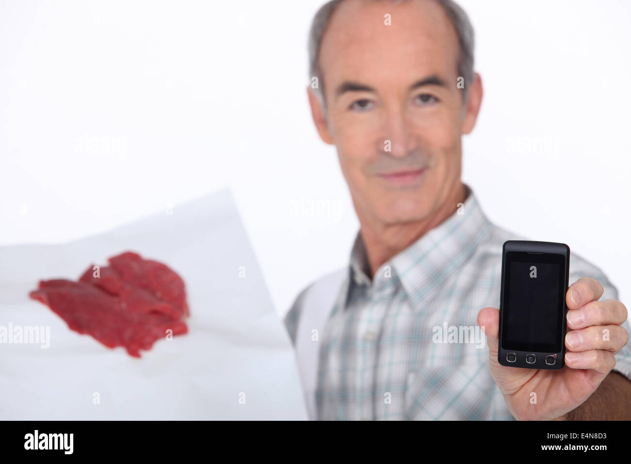 Butcher uniform sharpening knife hi-res stock photography and images ...