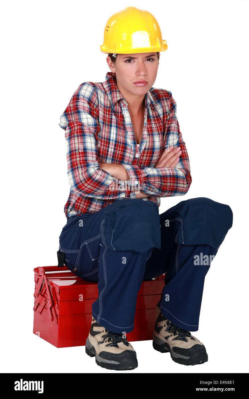 Irked construction worker Stock Photo - Alamy