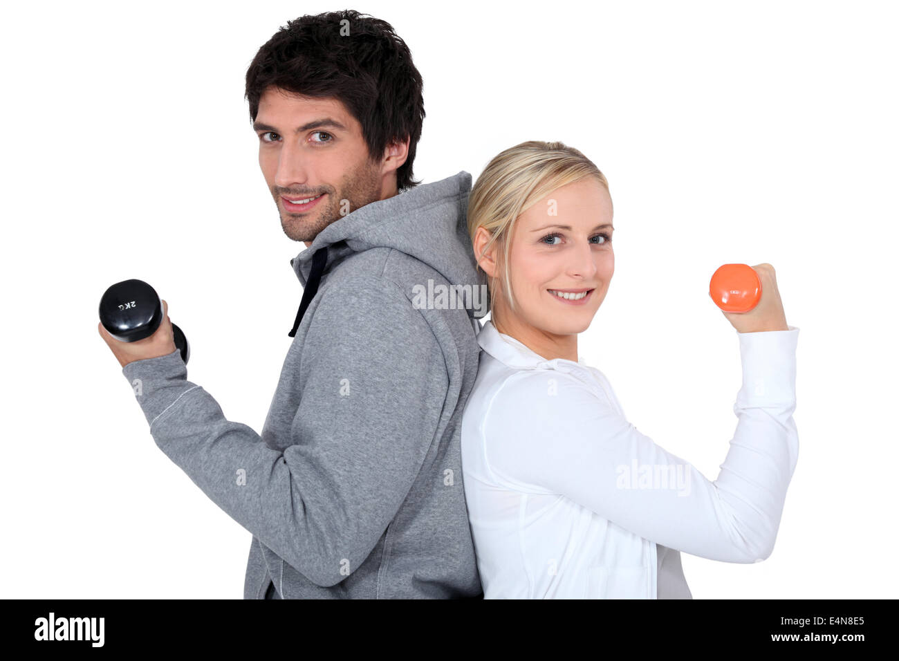 Couple working out together Stock Photo - Alamy