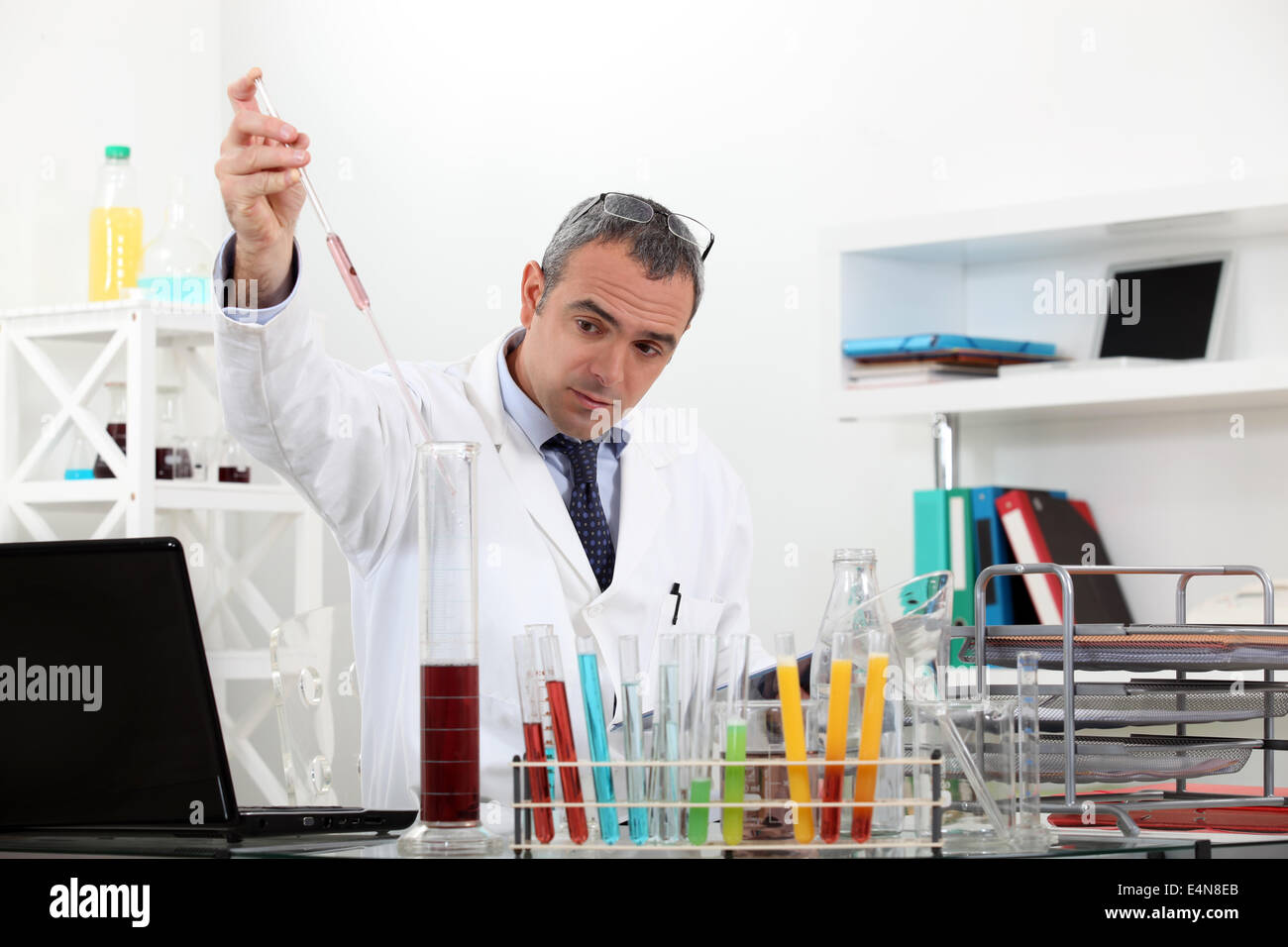 Man working in a laboratory Stock Photo - Alamy