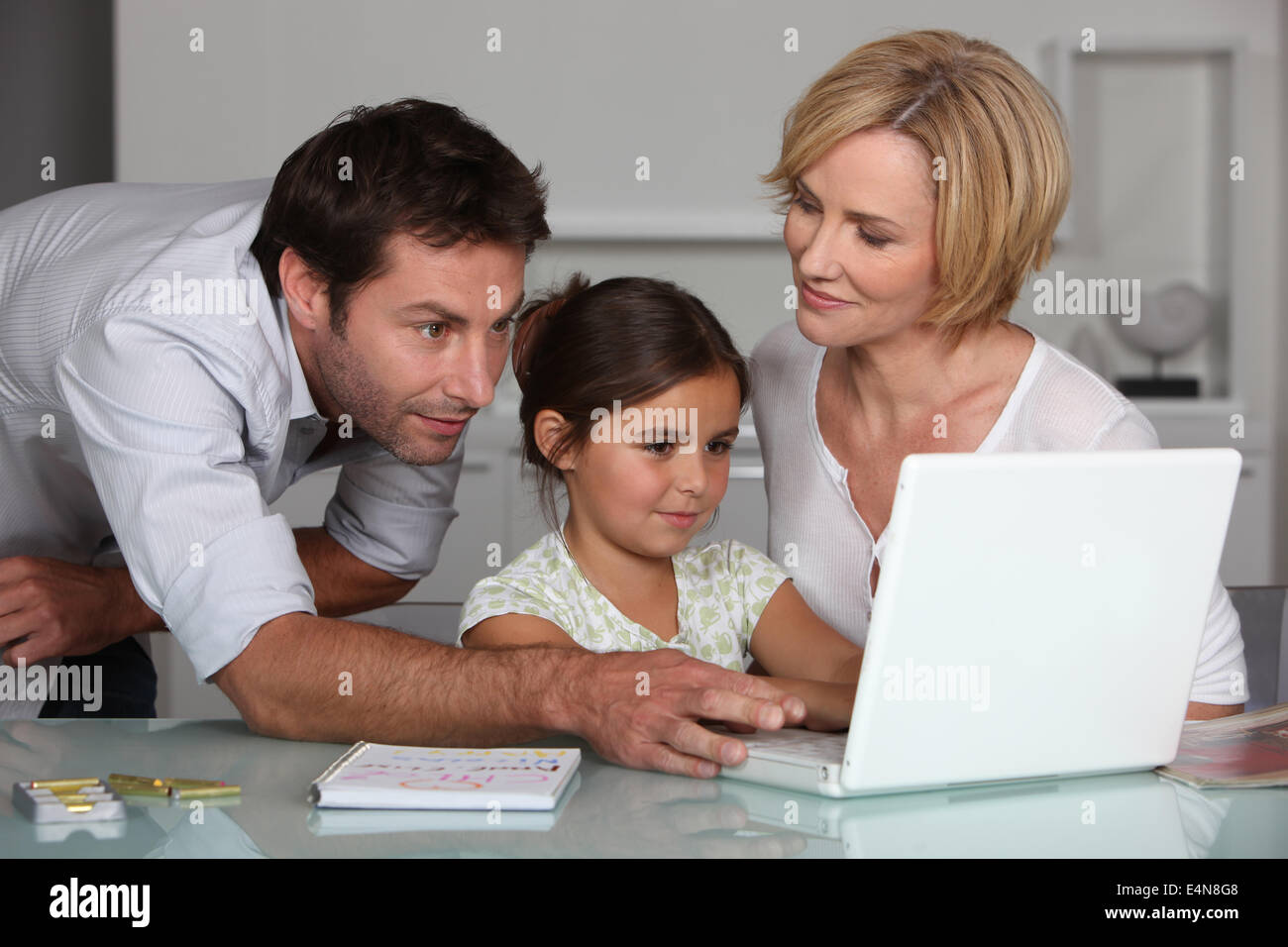 Parents and child Stock Photo - Alamy