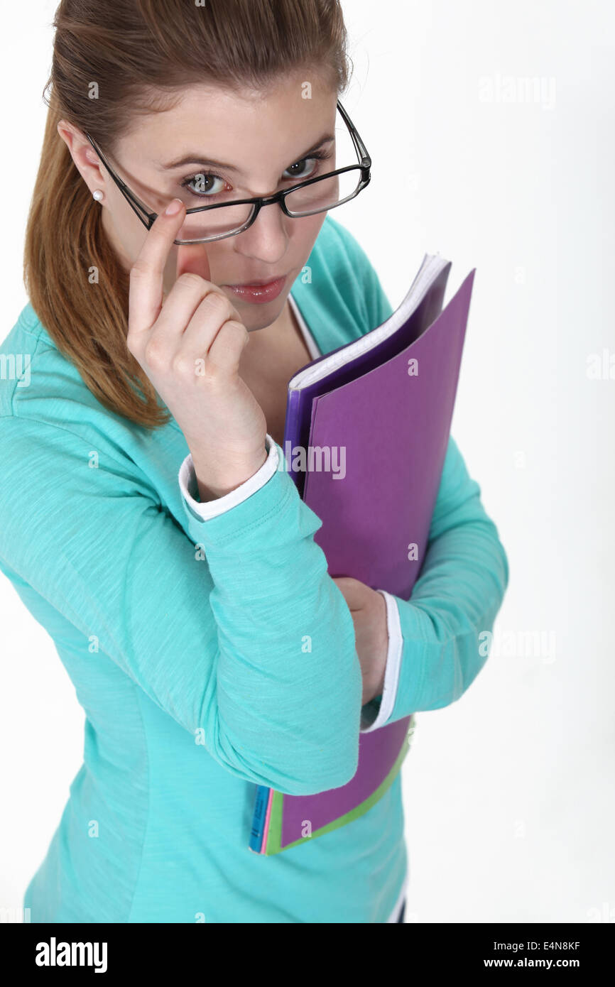 Secretary with folders tipping glasses Stock Photo - Alamy