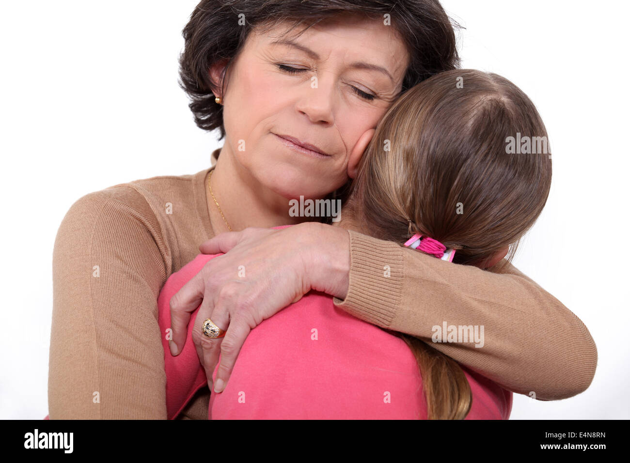 mother hugging daughter Stock Photo - Alamy