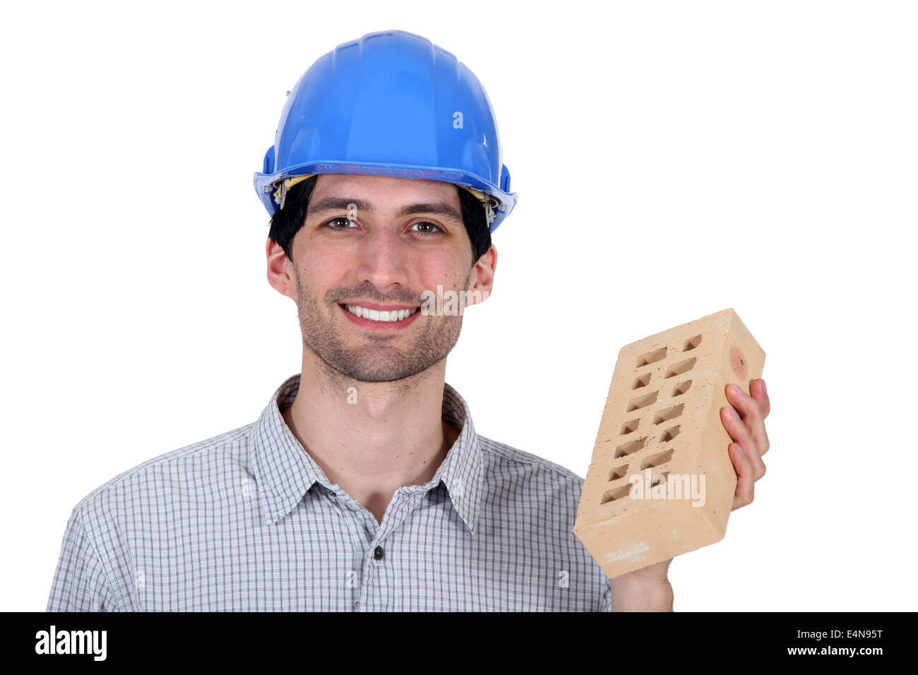 builder showing a brick Stock Photo - Alamy