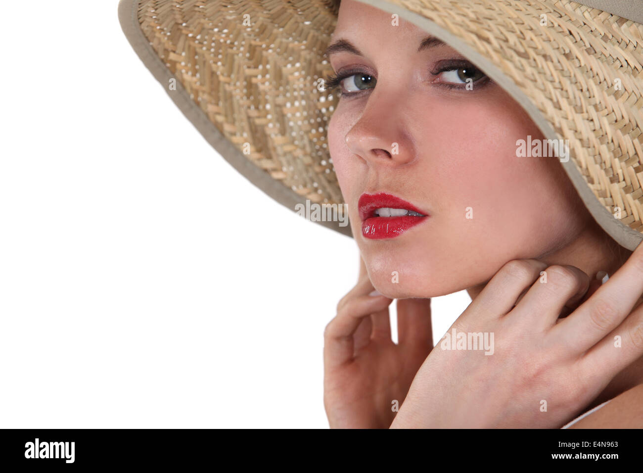 Woman wearing straw hat Stock Photo - Alamy
