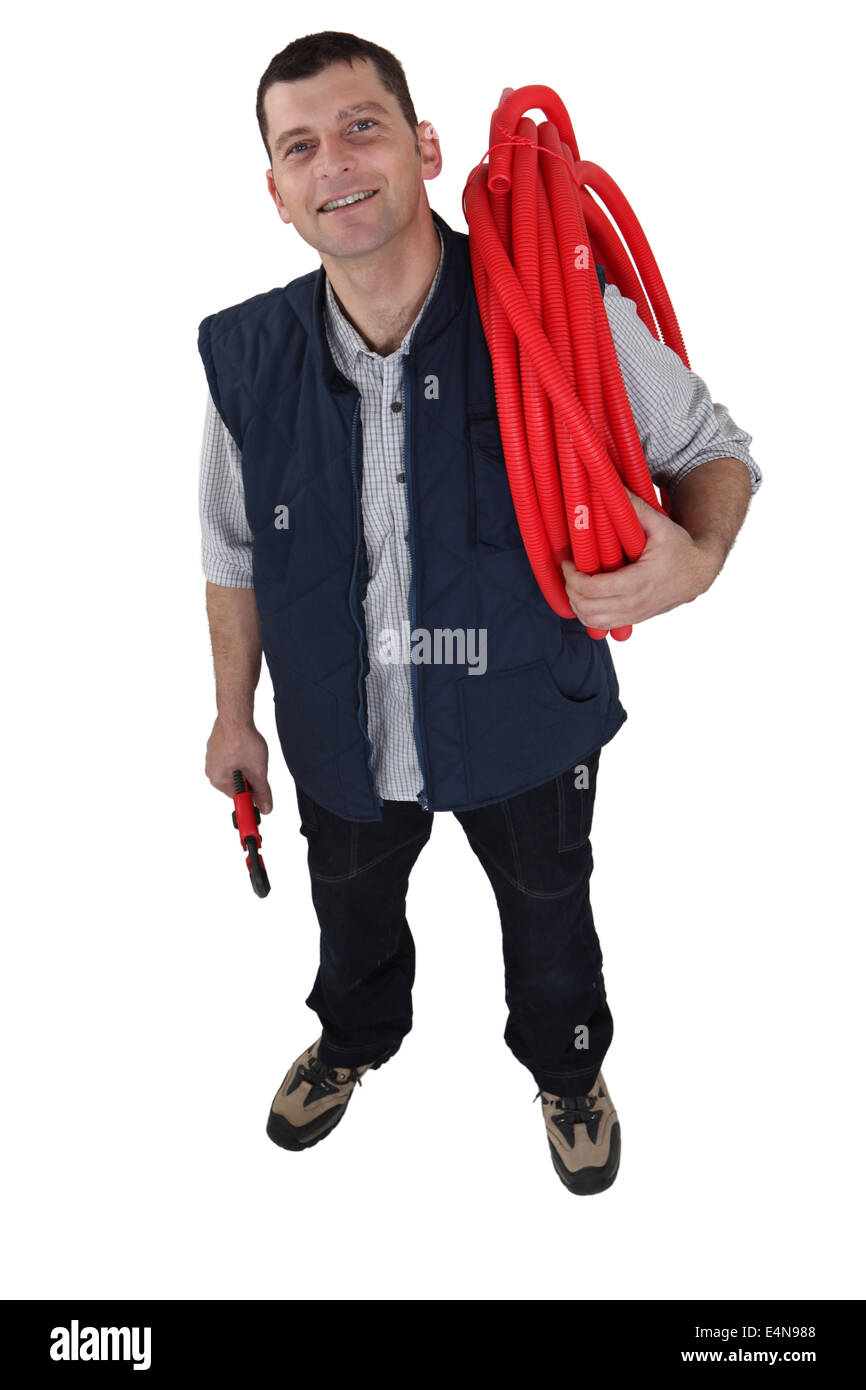 Plumber ready to change pipe work Stock Photo - Alamy