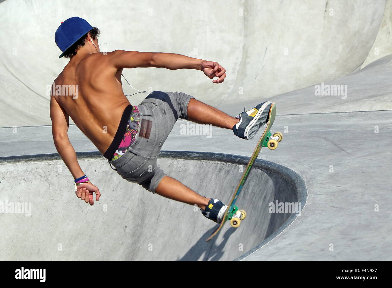Young man skating Stock Photo - Alamy