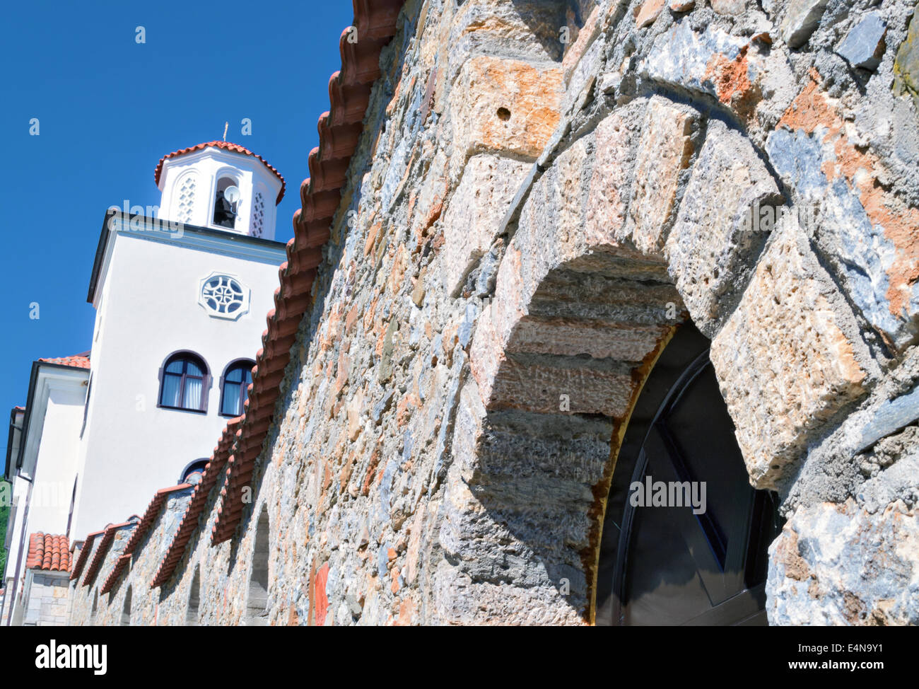 Rustic stone wall around the monastery in Rajcica Stock Photo - Alamy