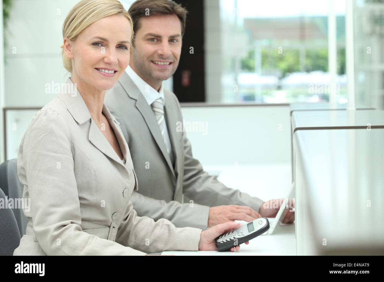 Hotel receptionist check in casual hi-res stock photography and images ...