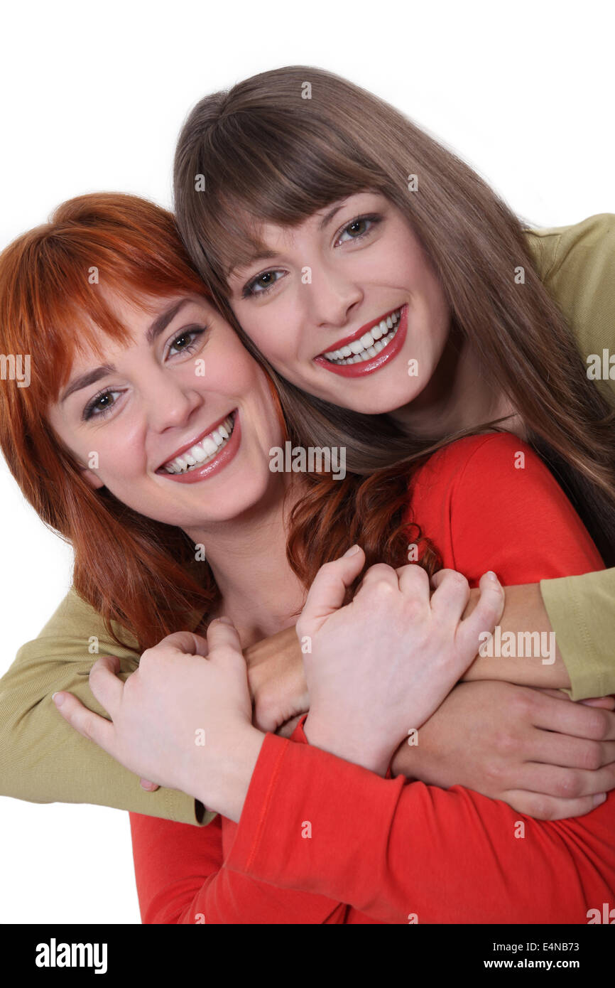 Portrait of smiling sisters Stock Photo - Alamy