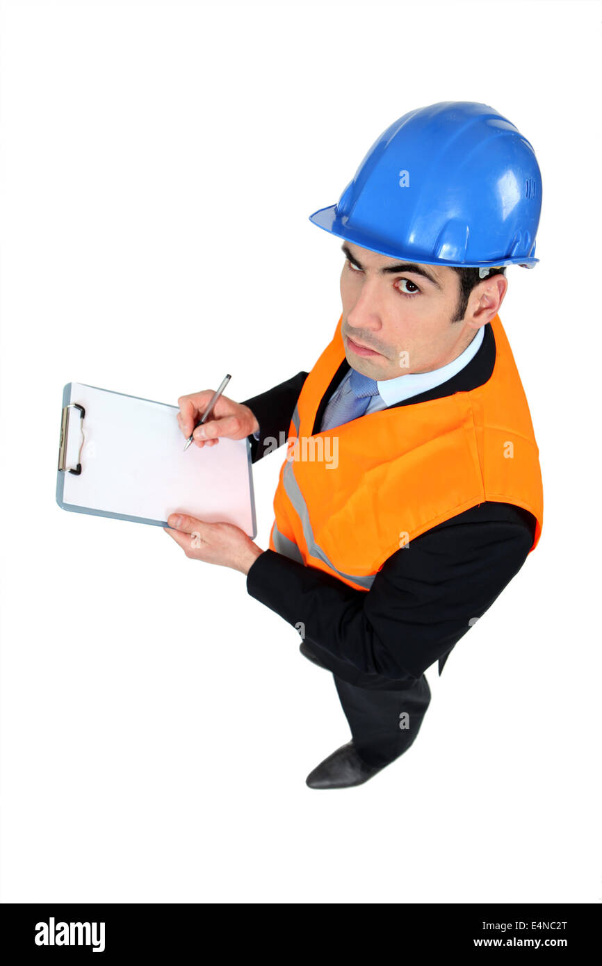 Man inspecting a premises Stock Photo - Alamy