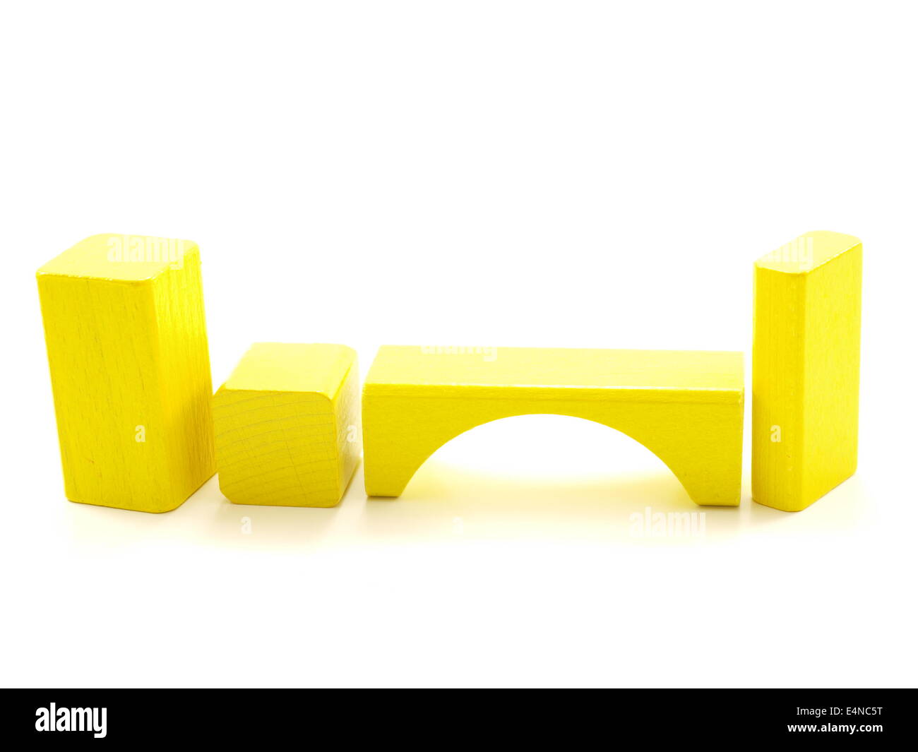 Yellow wooden bricks Stock Photo - Alamy