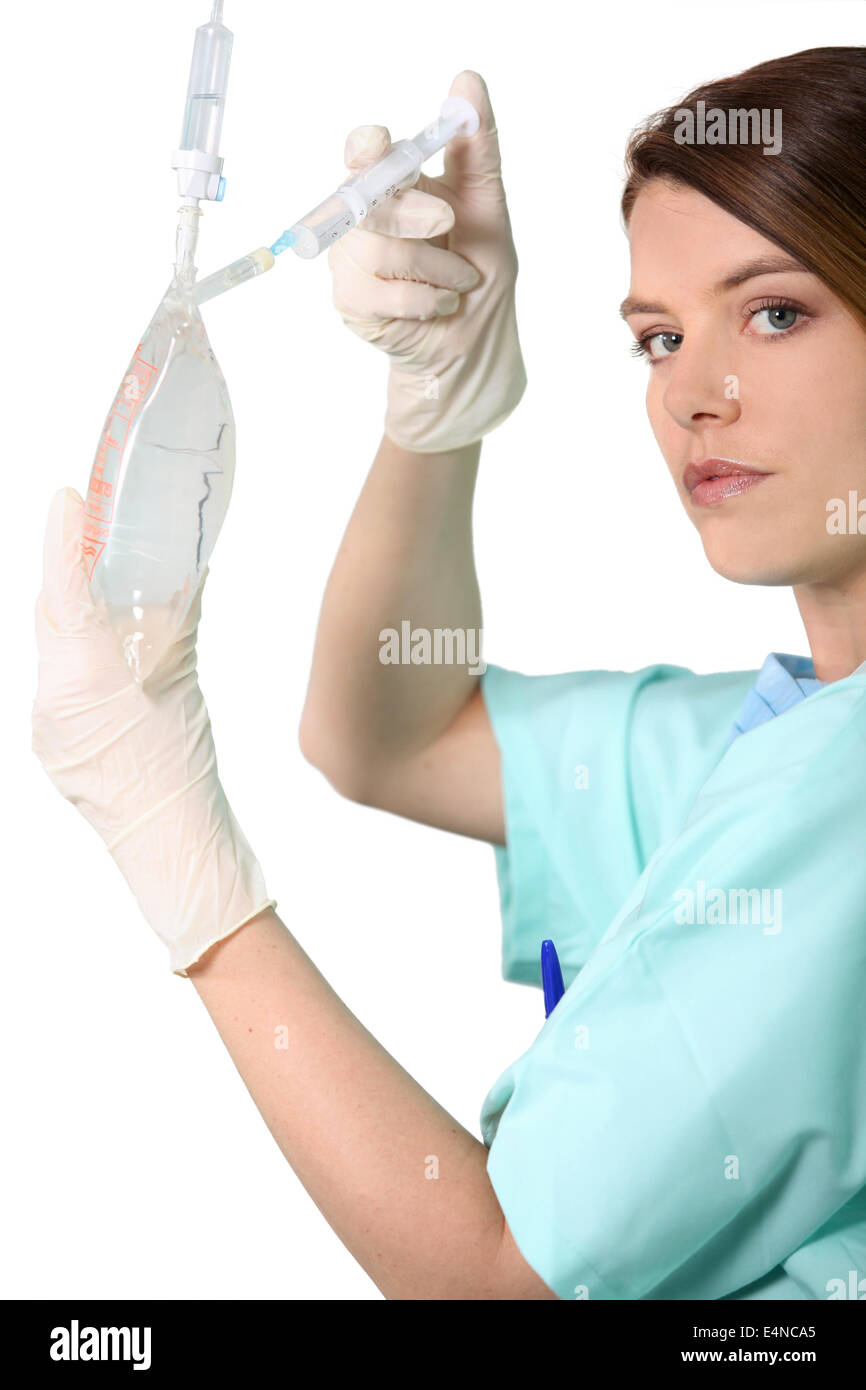 Female administering drugs hi-res stock photography and images - Alamy