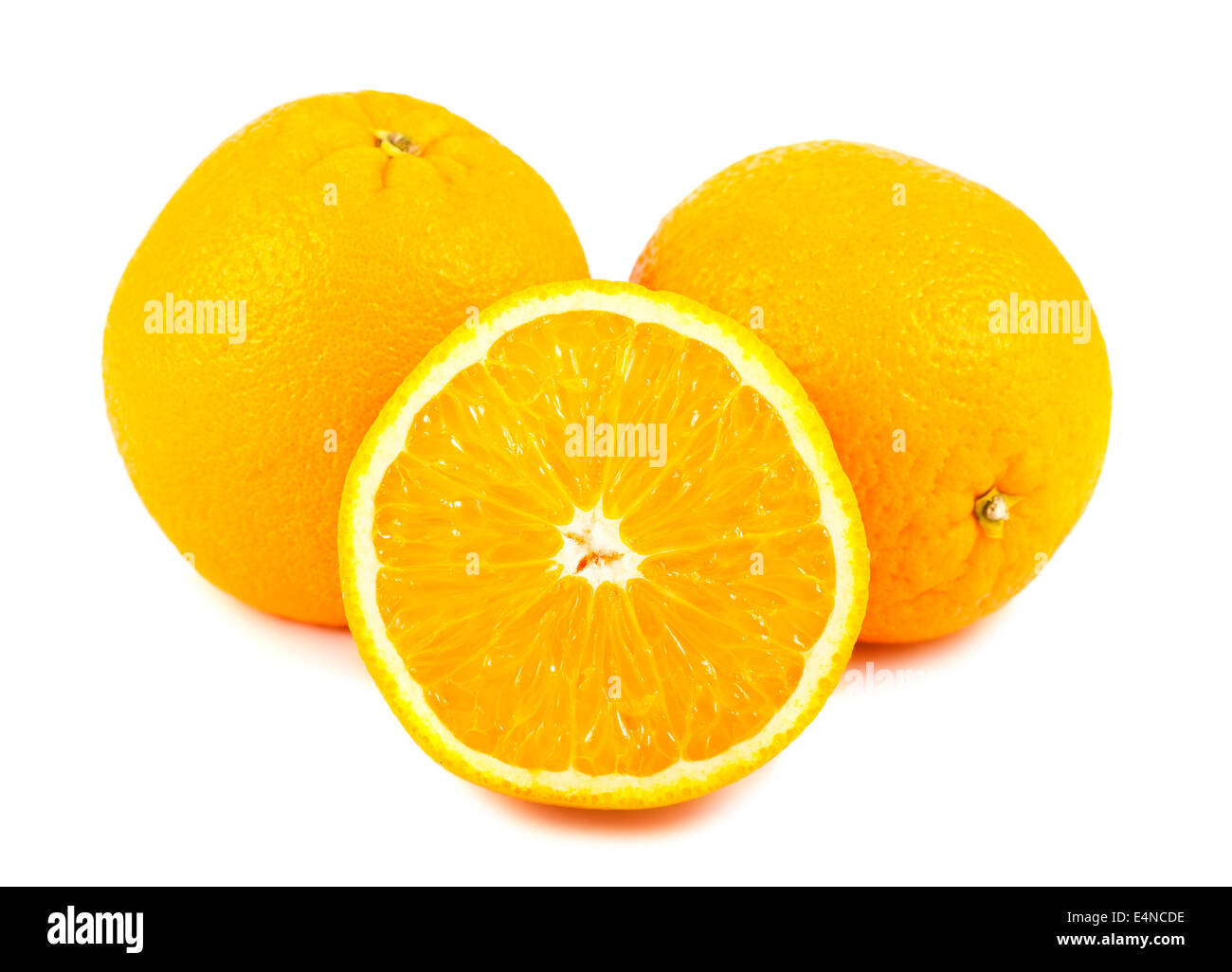 Sliced and whole orange fruits Stock Photo - Alamy