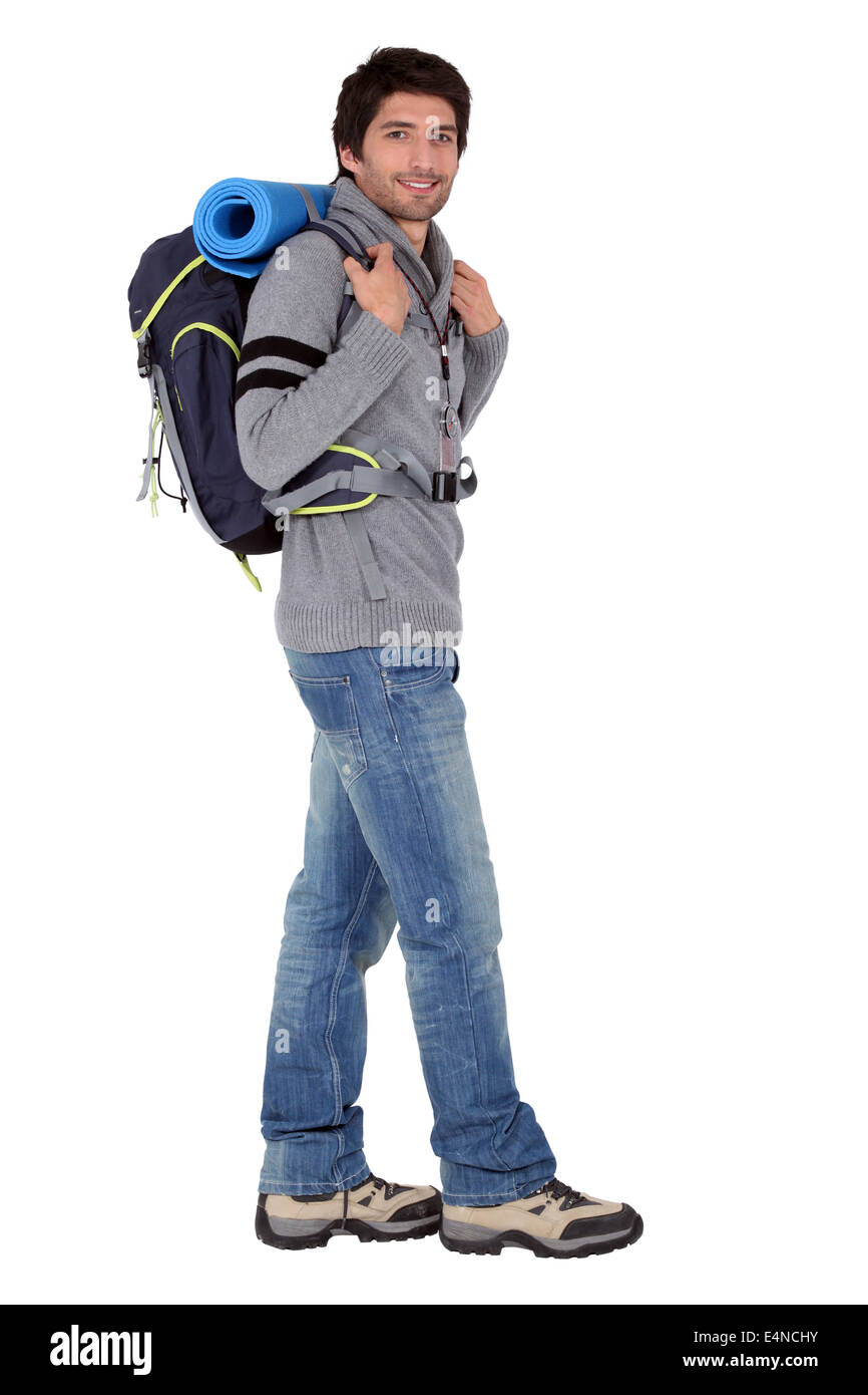 Male backpacker in studio Stock Photo - Alamy