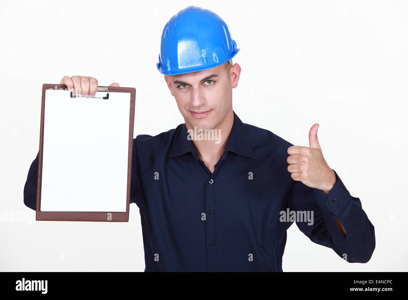Engineer with a blank clipboard Stock Photo - Alamy