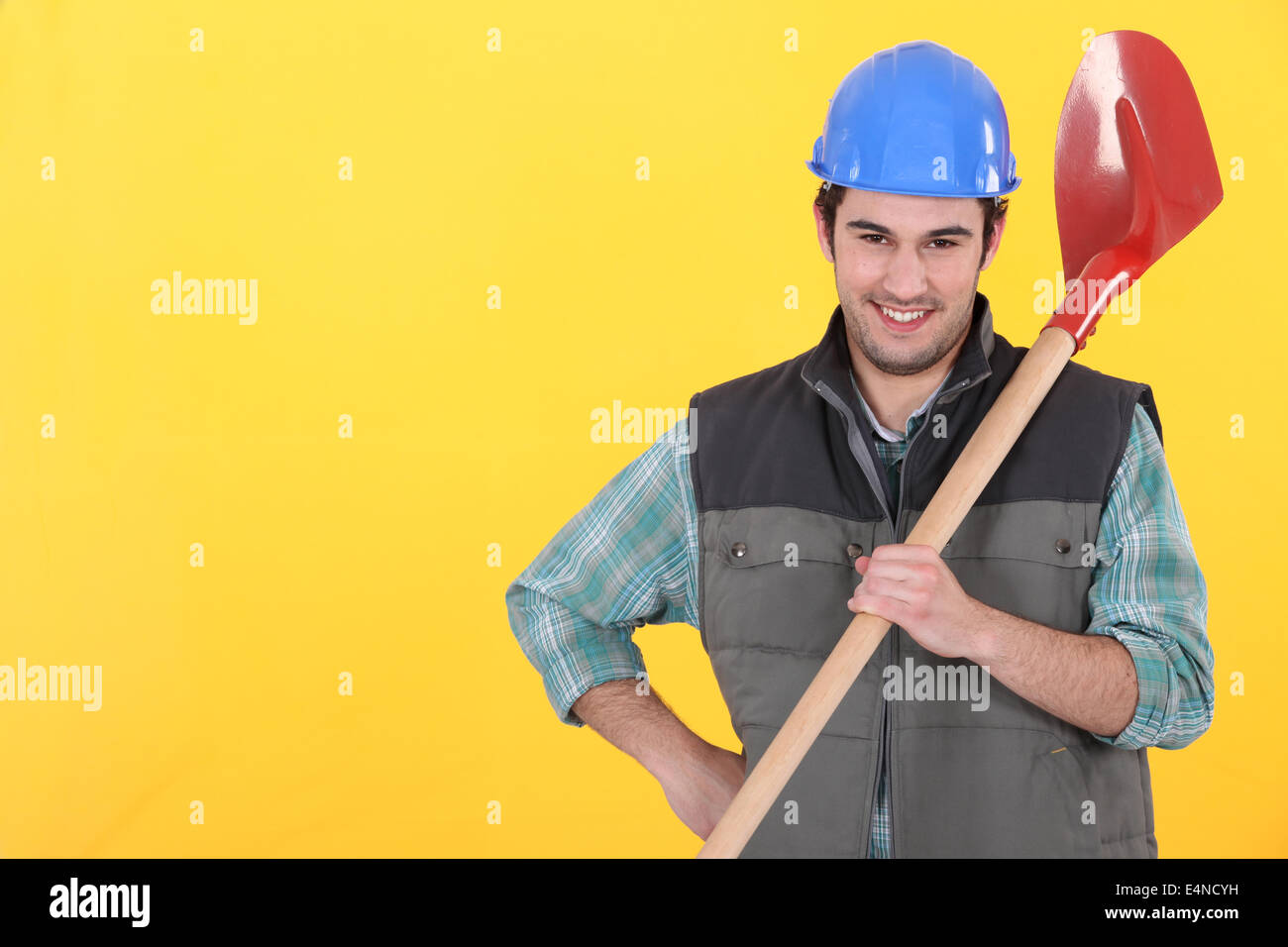 Man with a shovel Stock Photo - Alamy