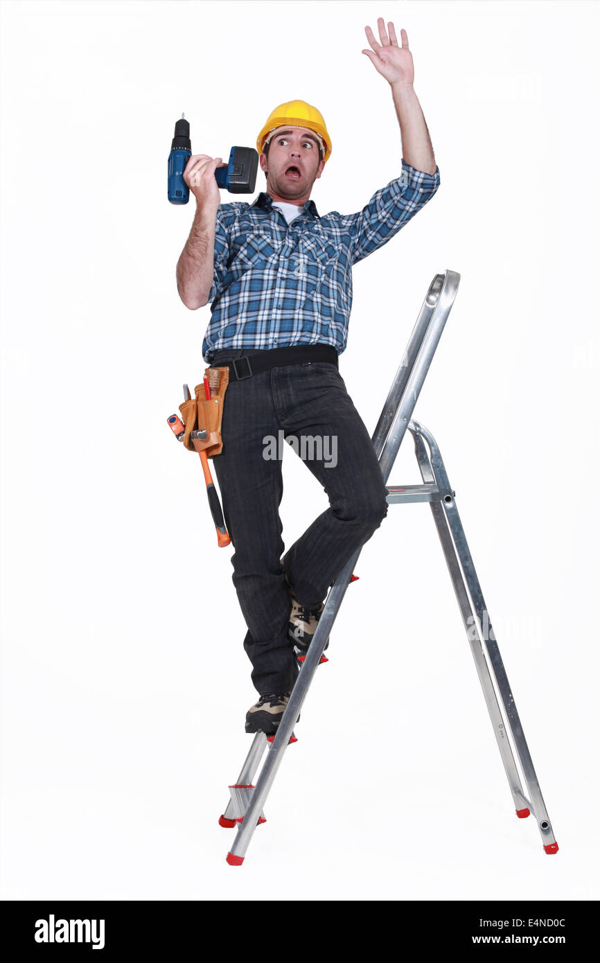 Worker falling of ladder Cut Out Stock Images & Pictures - Alamy