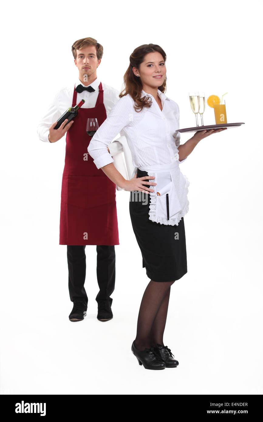 Waiter and waitress starting shift Stock Photo - Alamy