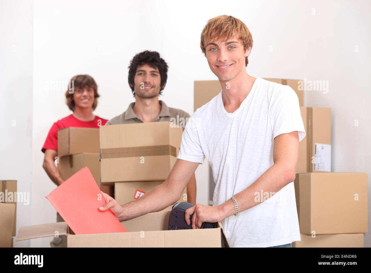 Trio friends moving in hi-res stock photography and images - Alamy