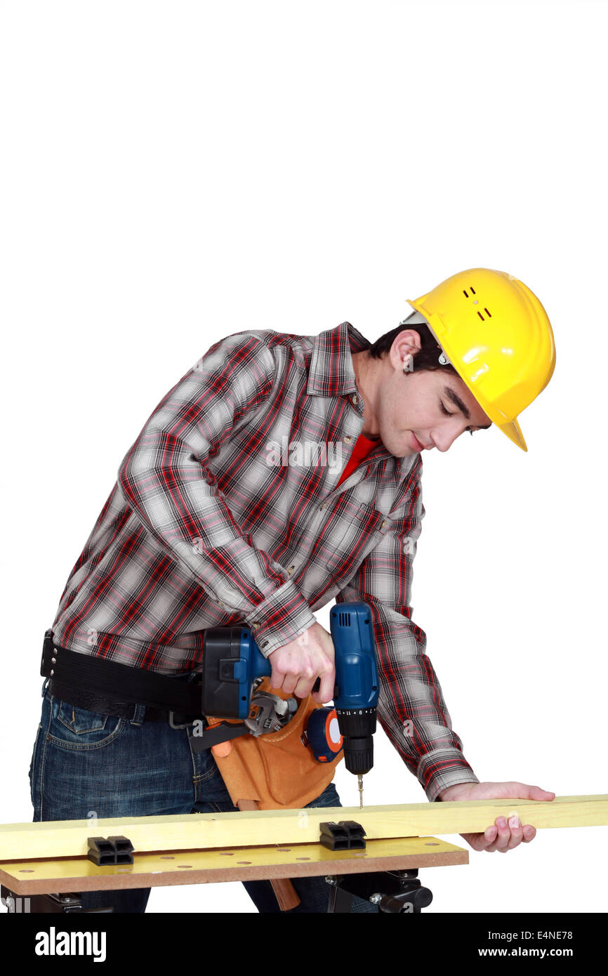 Man drilling hole factory hi-res stock photography and images - Alamy