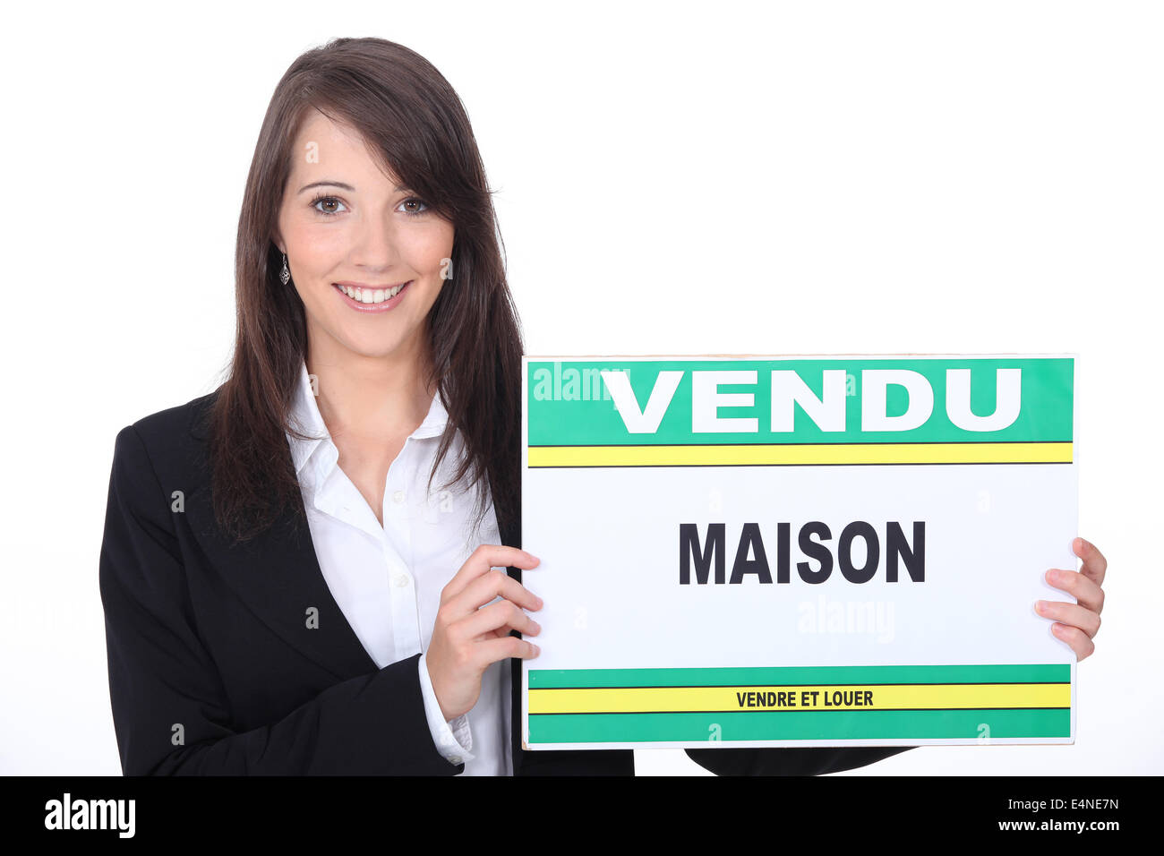 young estate agent with sold sign Stock Photo - Alamy