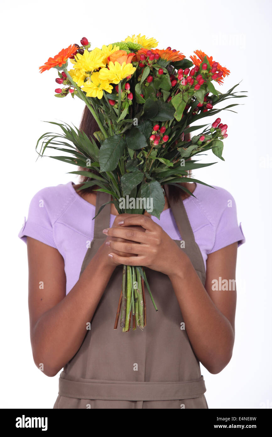 Hiding behind flowers Stock Photo - Alamy