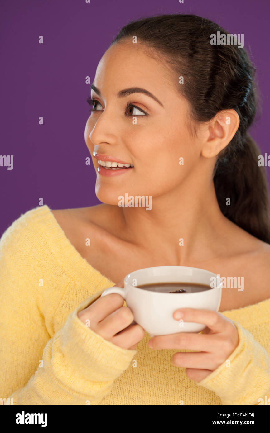 Beautiful woman drinking tea Stock Photo - Alamy