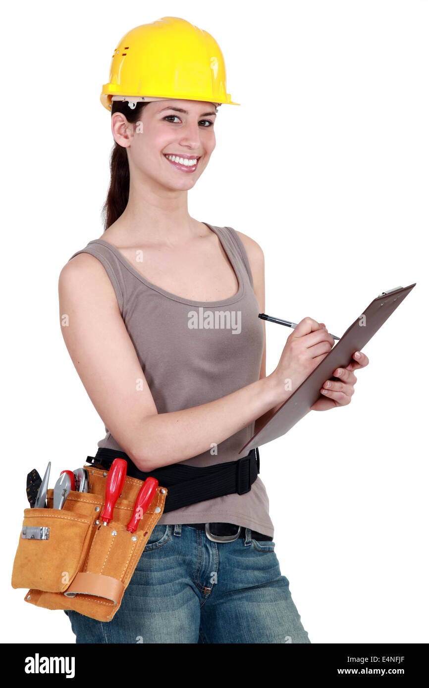 Female surveyor with clip-board and pen Stock Photo - Alamy