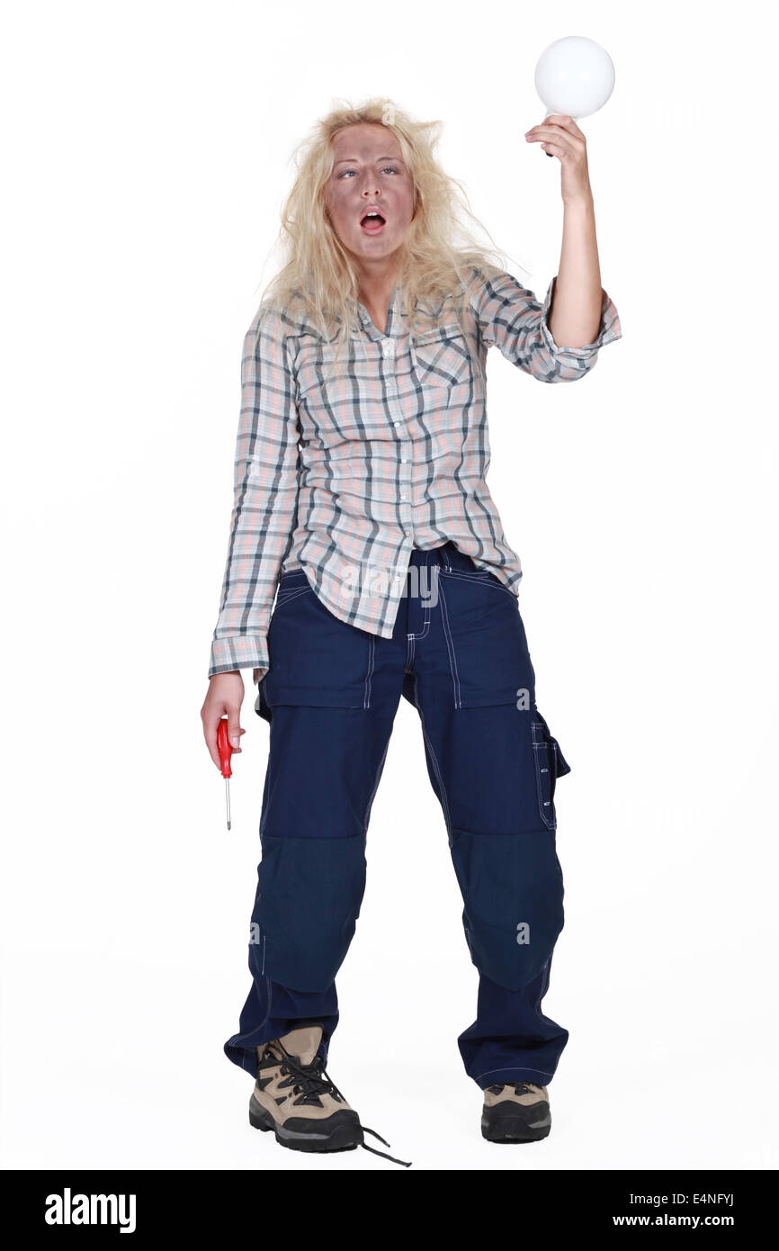 Woman getting an electric shock Stock Photo - Alamy