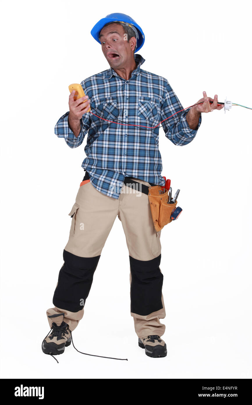 Electrician getting a shock Stock Photo - Alamy