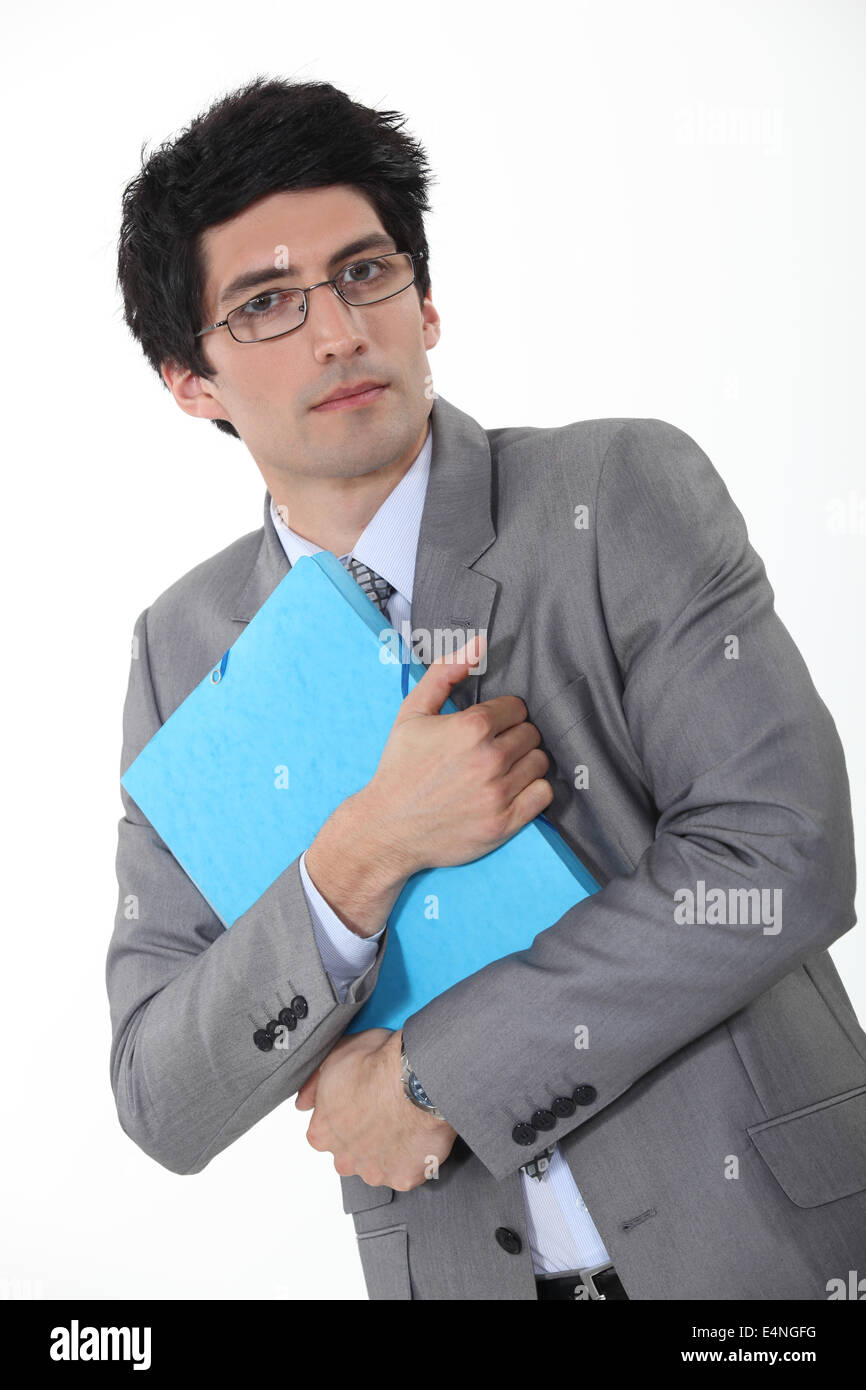young intellectual holding files Stock Photo - Alamy