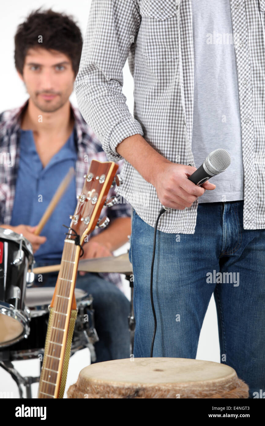 a singer and a drummer Stock Photo - Alamy