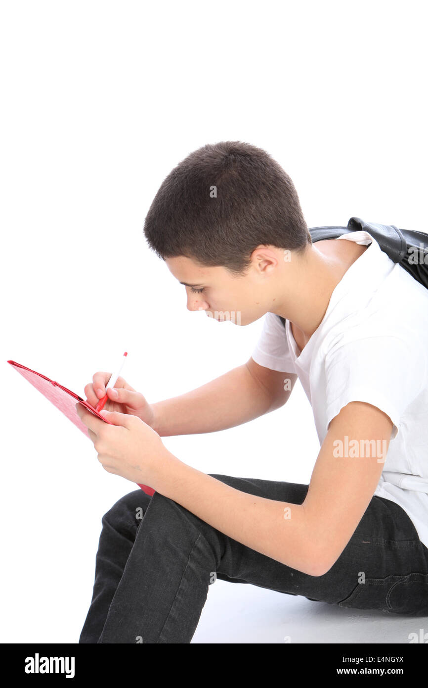 Young student doing homework Stock Photo - Alamy