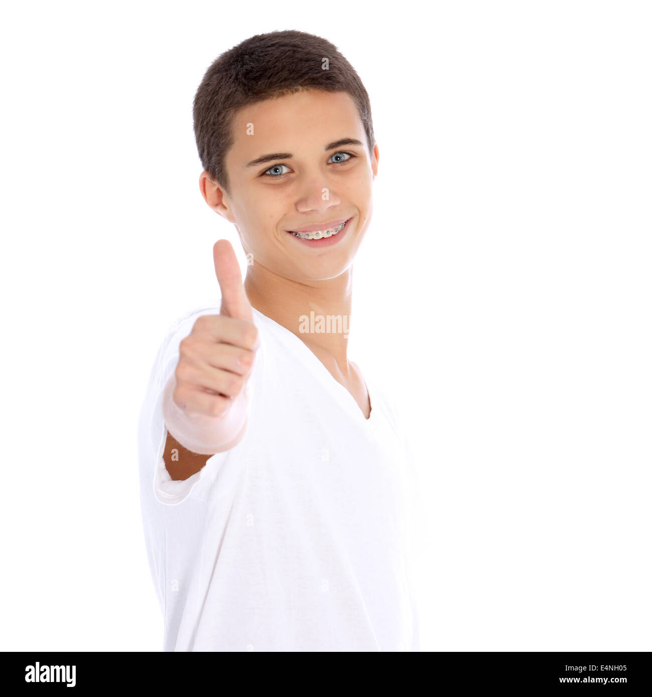 Smiling teenage boy giving thumbs up Stock Photo - Alamy