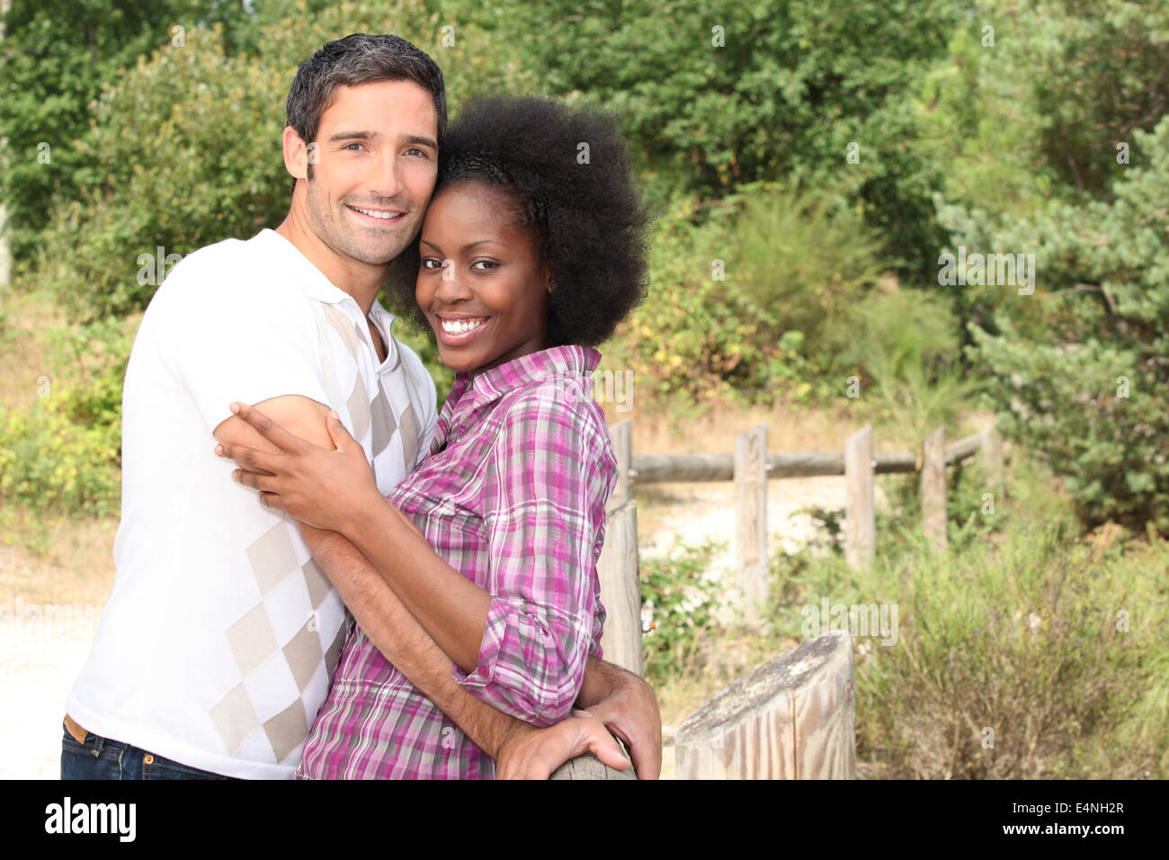 Couple having a cuddle hi-res stock photography and images - Alamy