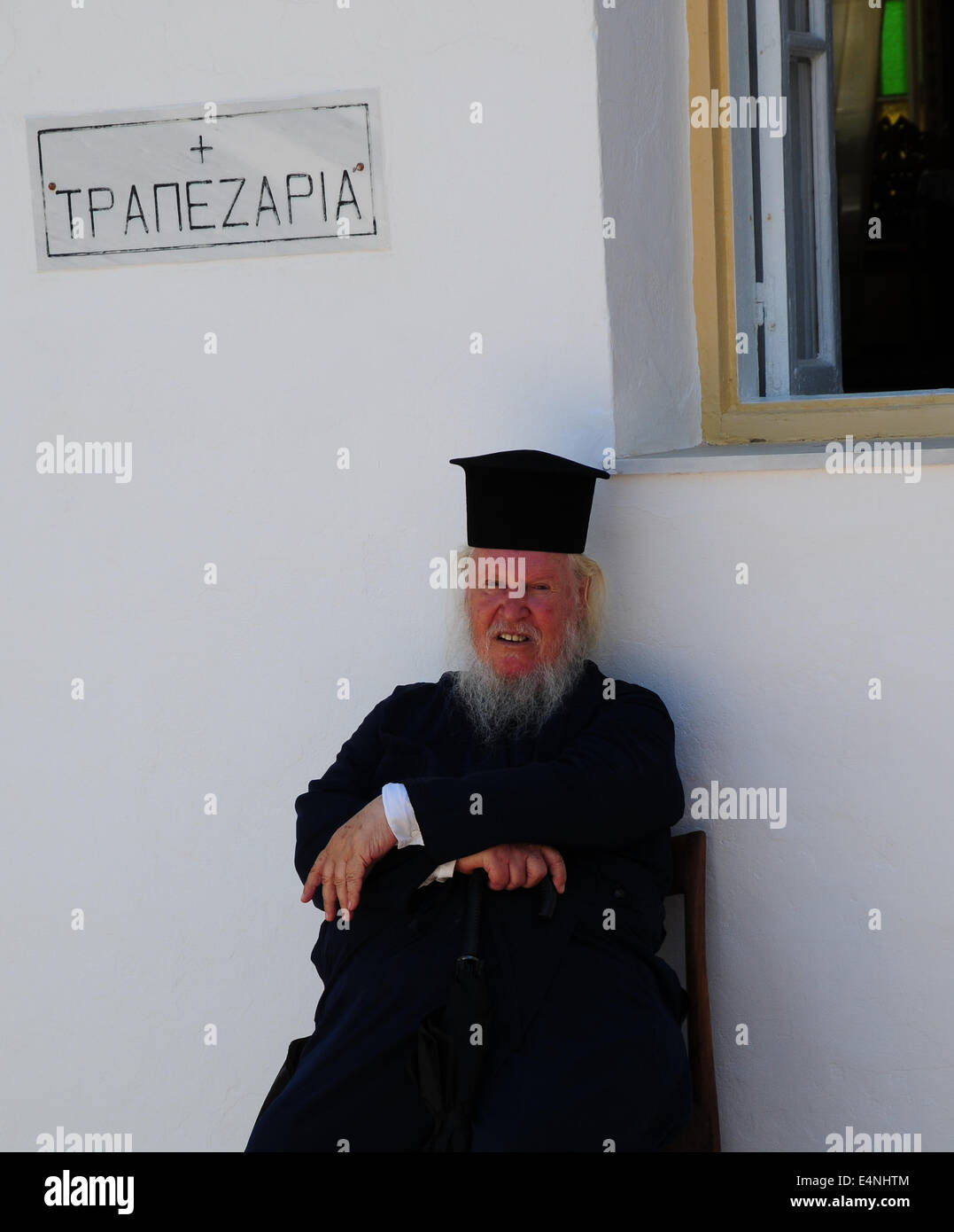 Greek monk in Panormitis monastery, Greek island of Symi Stock Photo ...