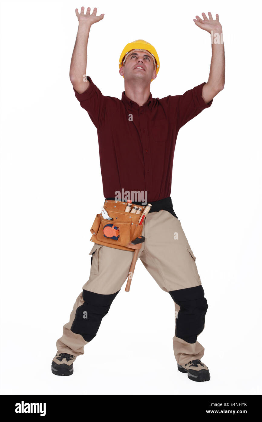 Builder under pressure Stock Photo - Alamy