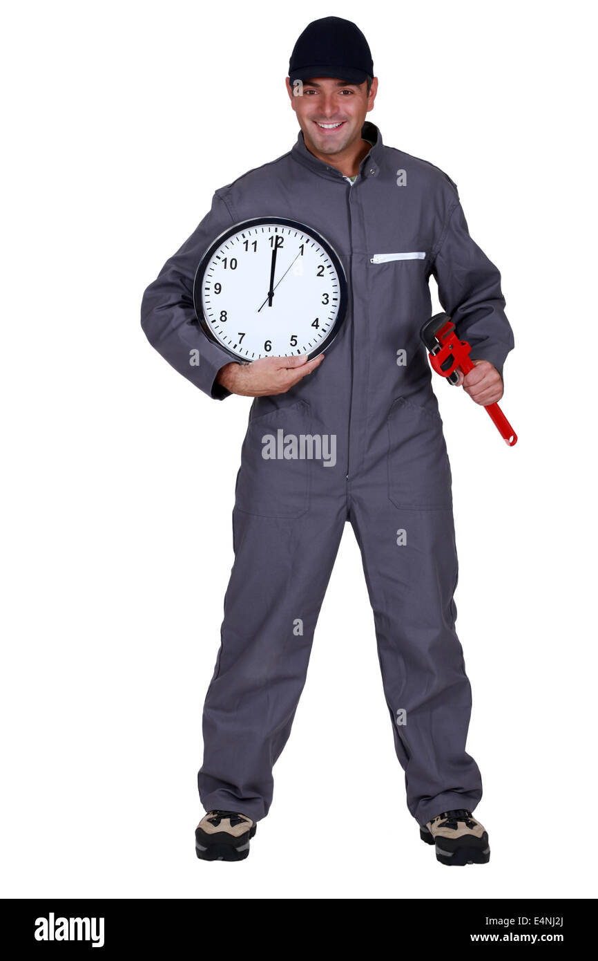 Craftsman wrench and clock Stock Photo - Alamy