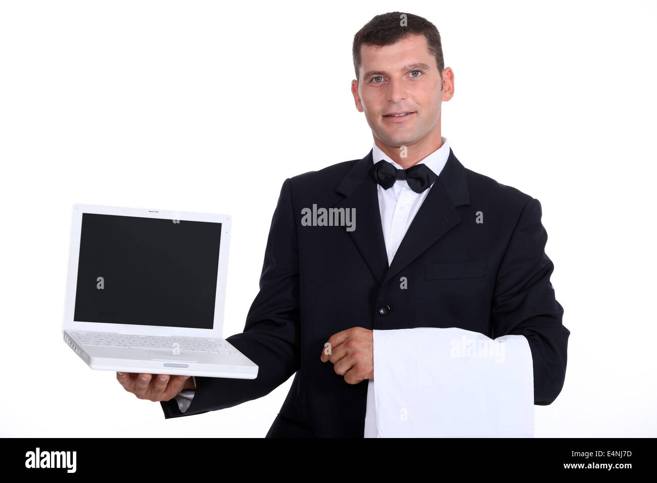 Waitor holding laptop Stock Photo - Alamy